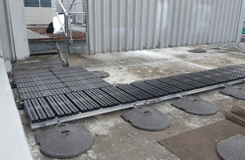 Stepover platforms for roof maintenance access - Simplified Safety